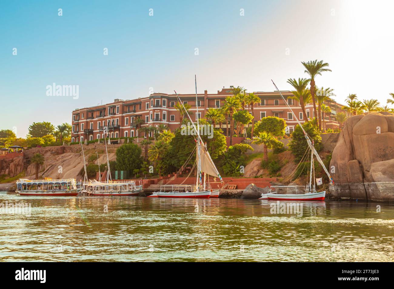 The famous Cataract Hotel in Aswan in the morning. View from the Nile ...