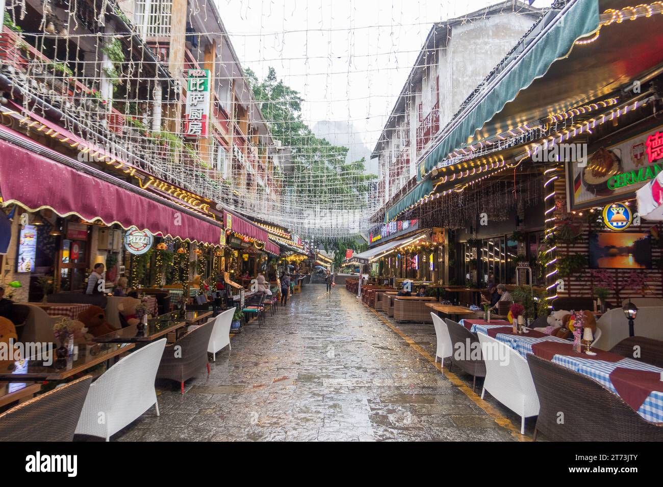 Shopping street in a small Chinese town Stock Photo - Alamy