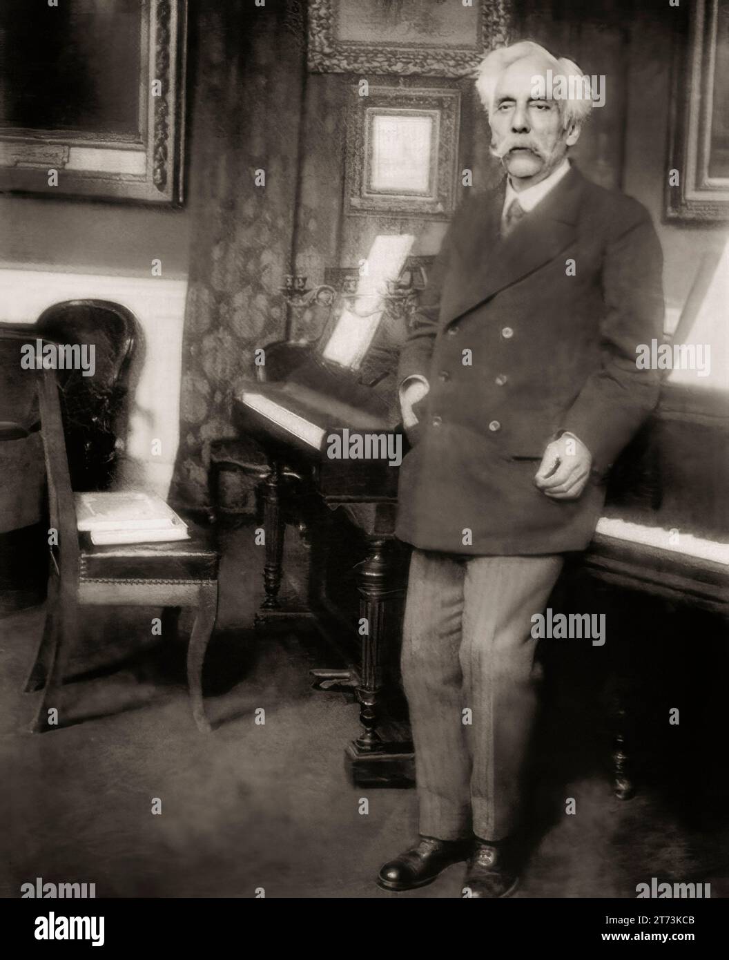 Gabriel Fauré, 1845 – 1924, French composer, next to his piano in his ...