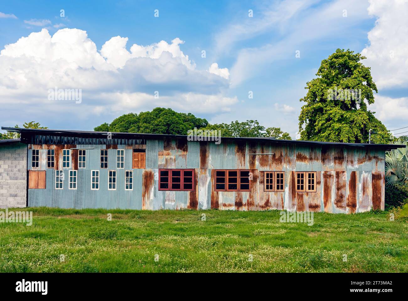 Facade house with old zinc wall. Beautiful vintage galvanized sheet ...