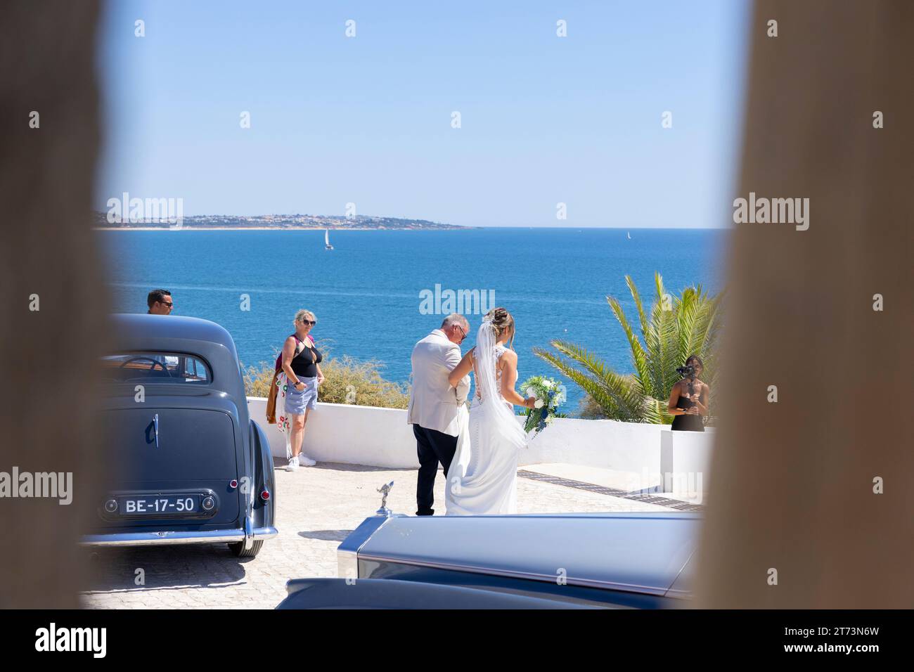 Algarve, Portugal - 13.09.2023: Bride and father walking to wedding to ...