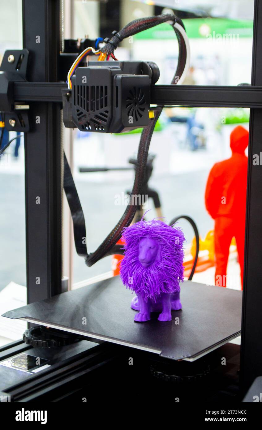 Model of toy lion printed on 3D printer from melted plastic purple ...