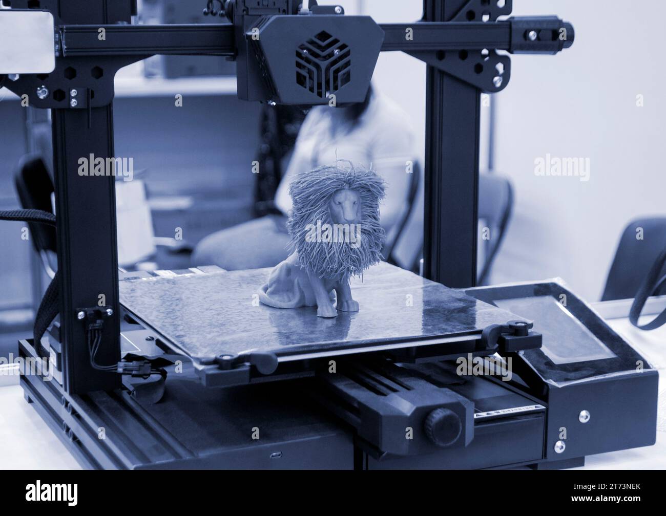 Model of toy lion printed on 3D printer from melted plastic blue color ...