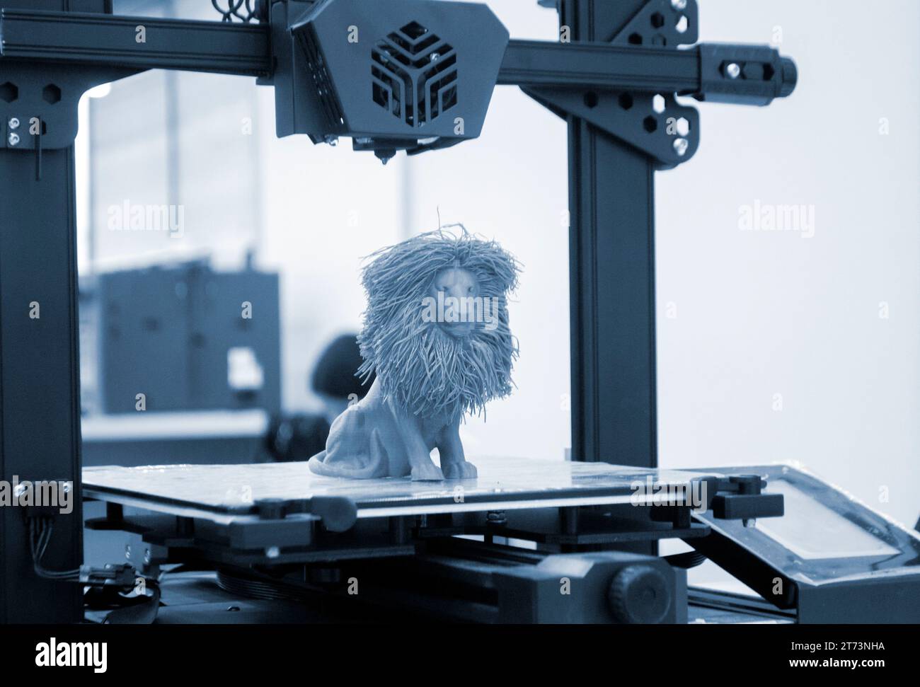Model of toy lion printed on 3D printer from melted plastic blue color ...