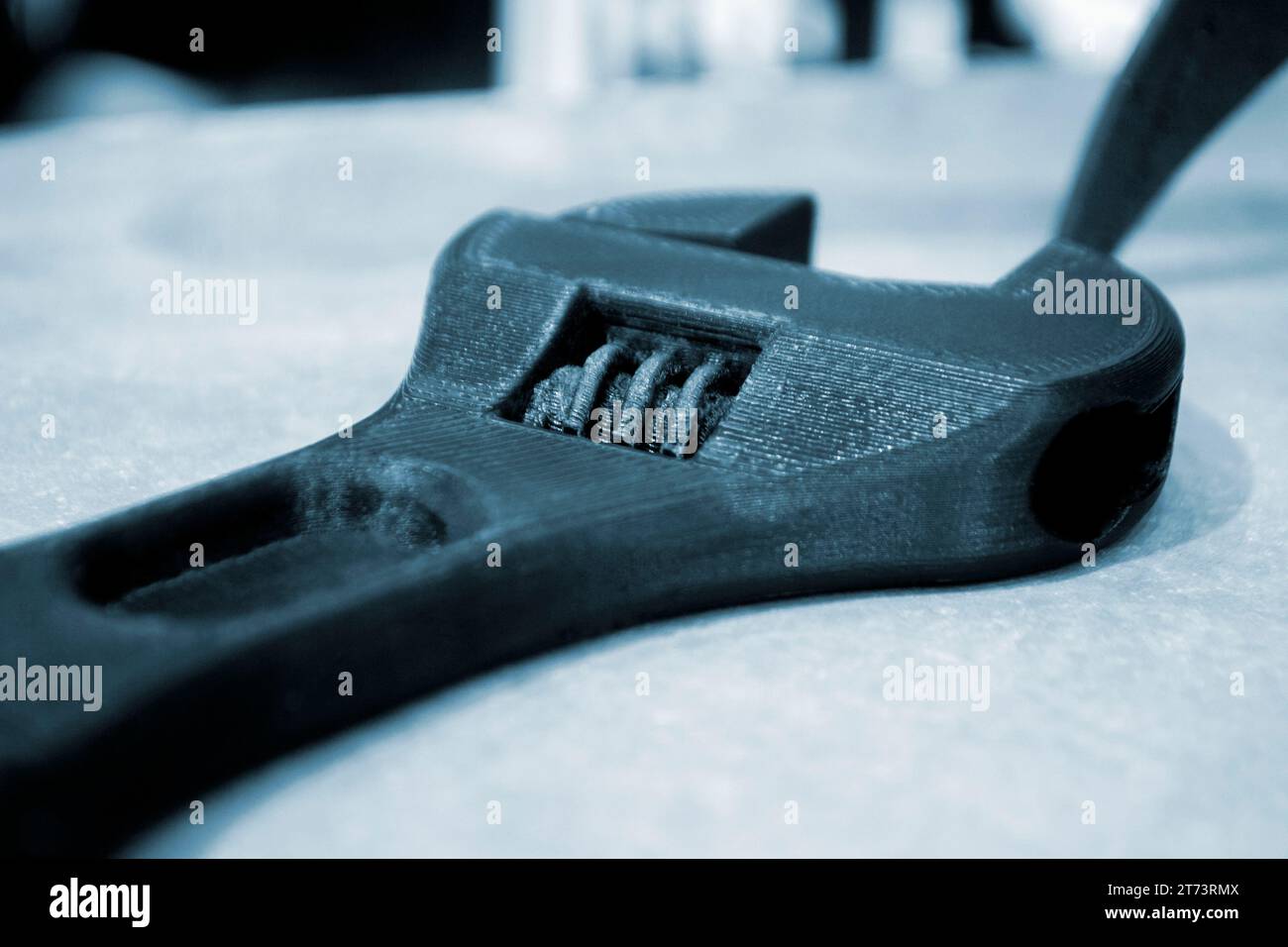 Model prototype of an adjustable wrench from of black plastic printed ...