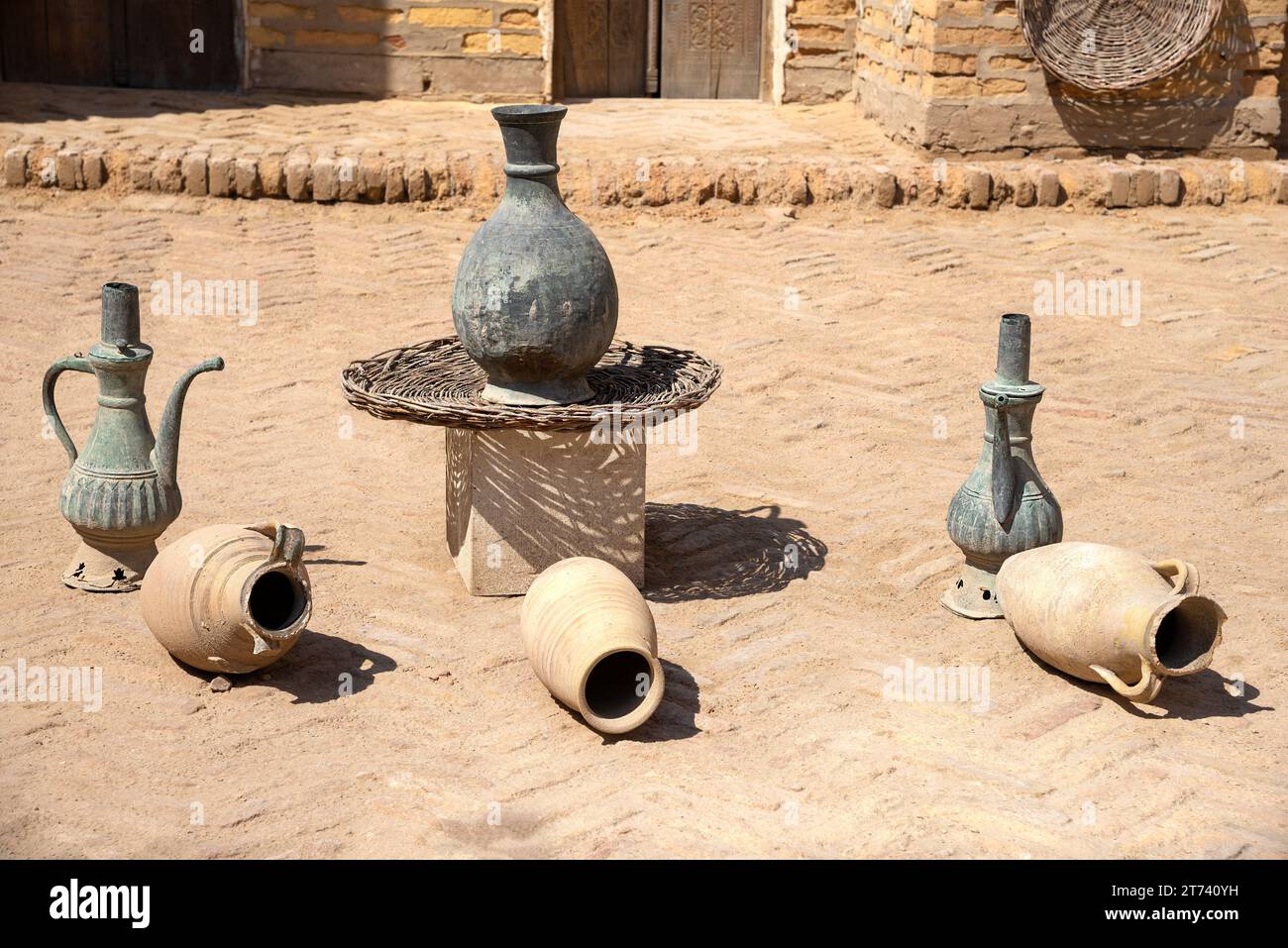 Medieval dishes in one of the old courtyards in the historical part of ...