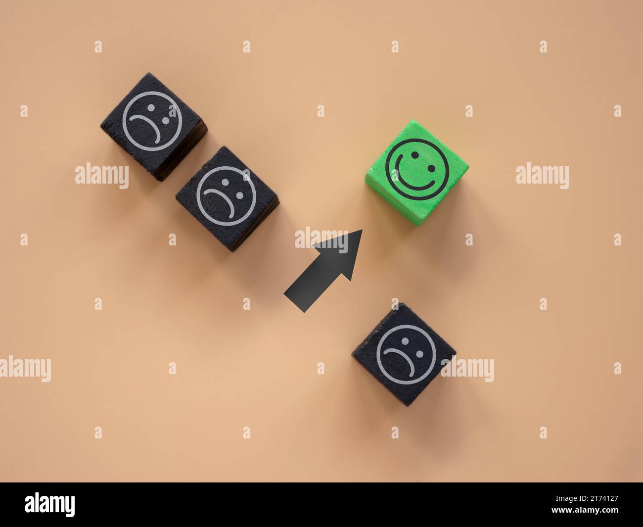 Cubes with sad faces and one with happy ones. Positive thinking and new ...