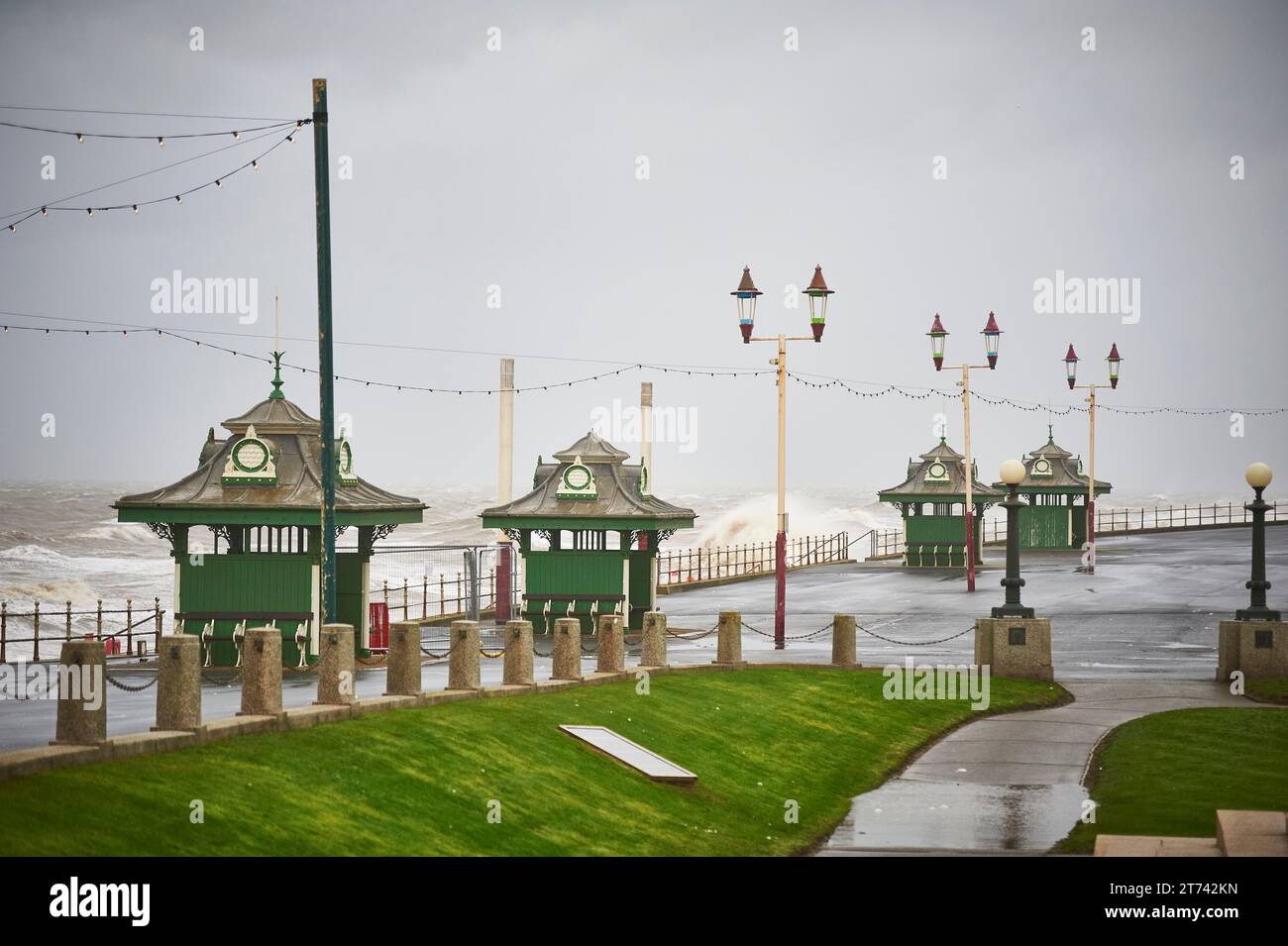Storm Debi blowing in Blackpool in November 2023. Seafront shelters ...