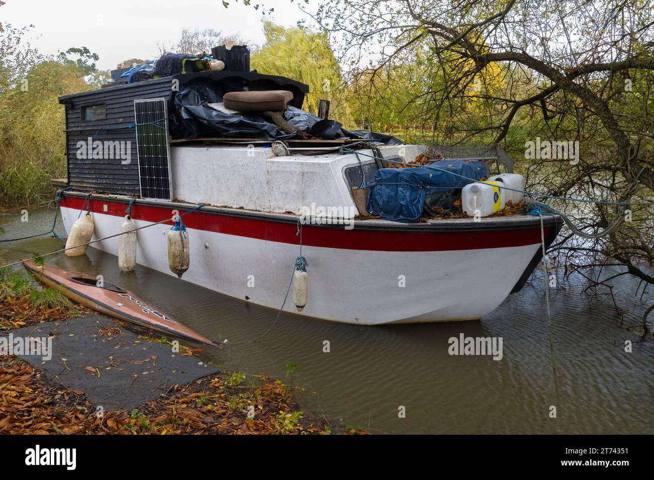 'A riverside stroll' -Live-aboard house boats along the river side ...