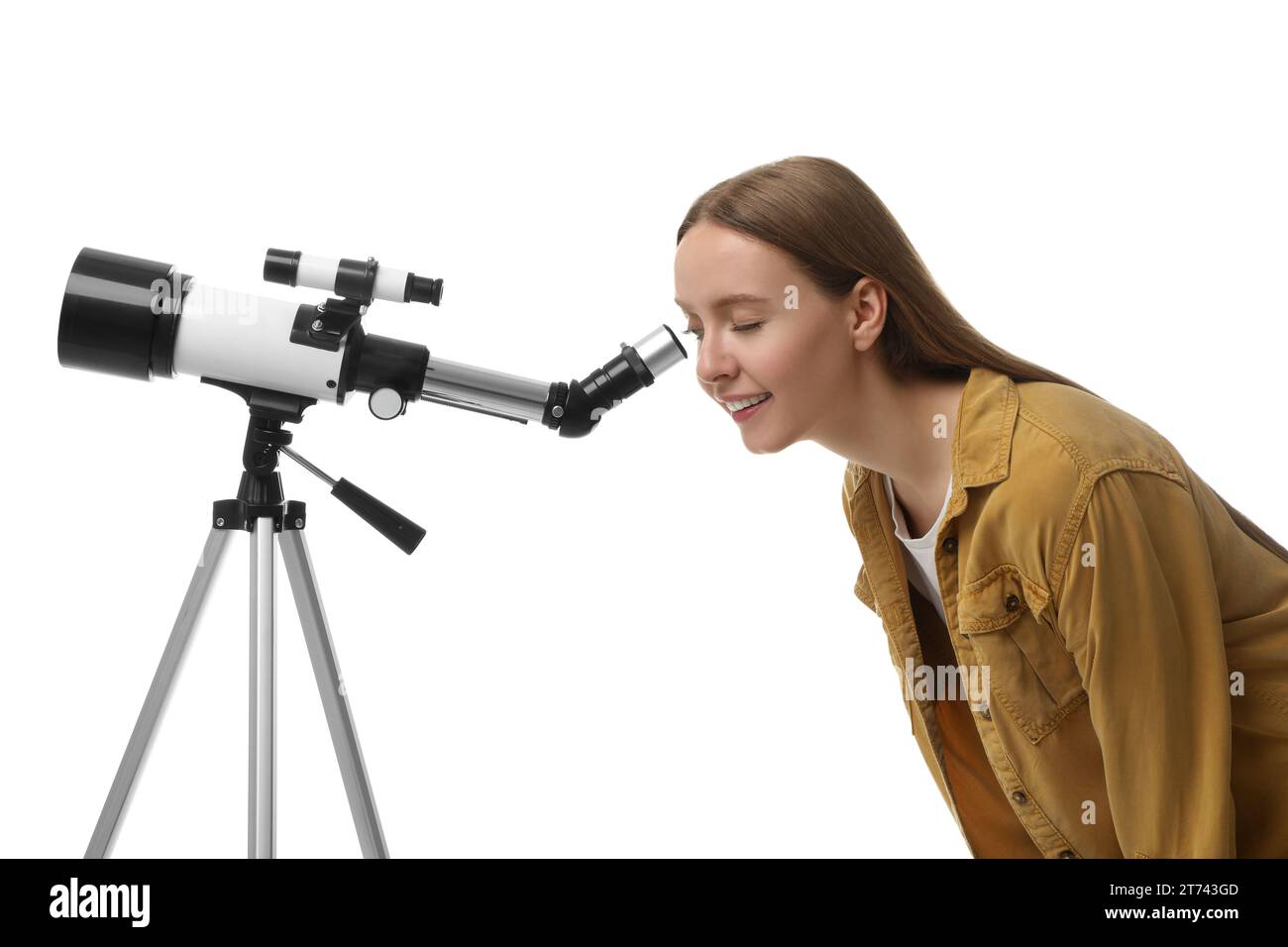 Young astronomer looking at stars through telescope on white background ...