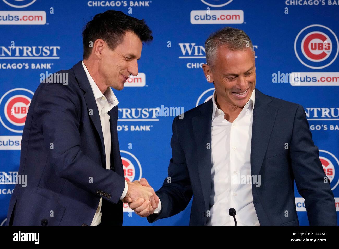 Chicago Cubs president of baseball operations Jed Hoyer, right, shakes ...