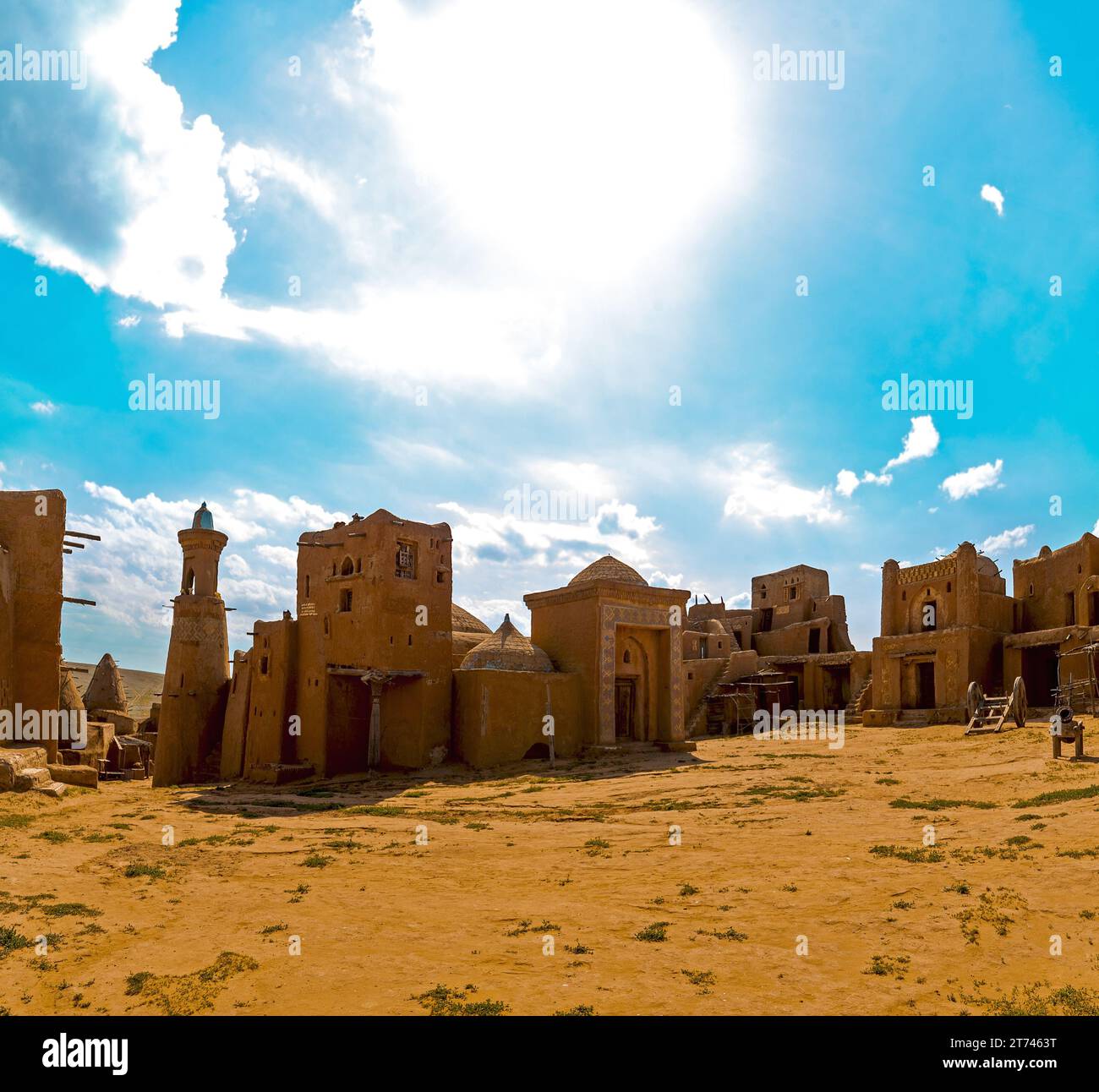 Scorched bright sun Muslim village of clay covered with baked bricks ...