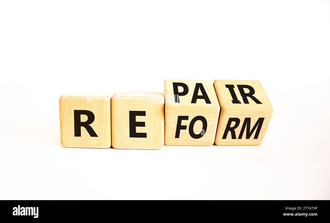 Reform and repair symbol. Concept words Reform Repair on wooden block ...