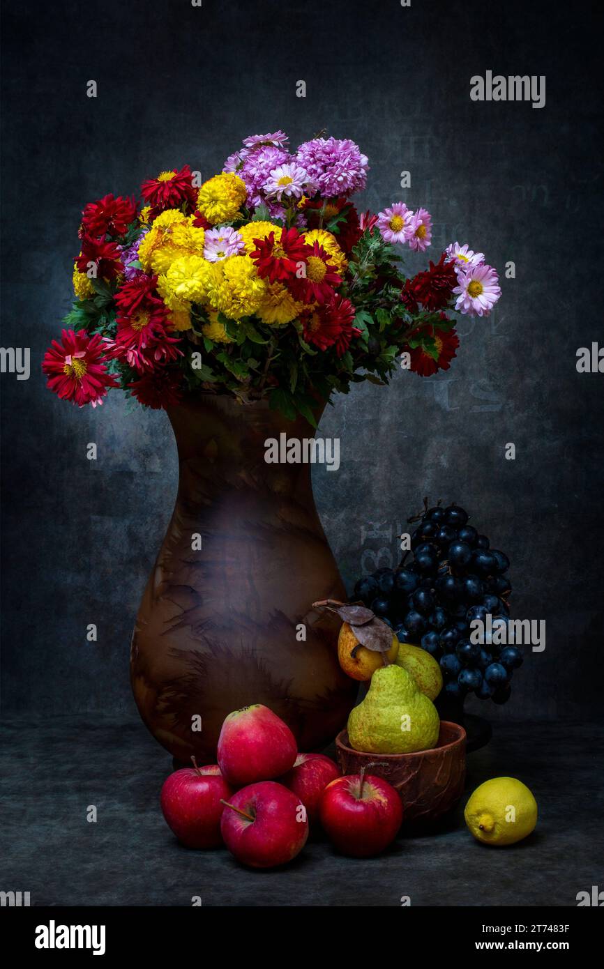 Still life with a bouquet of chrysanthemums in a vase and fruits Stock ...