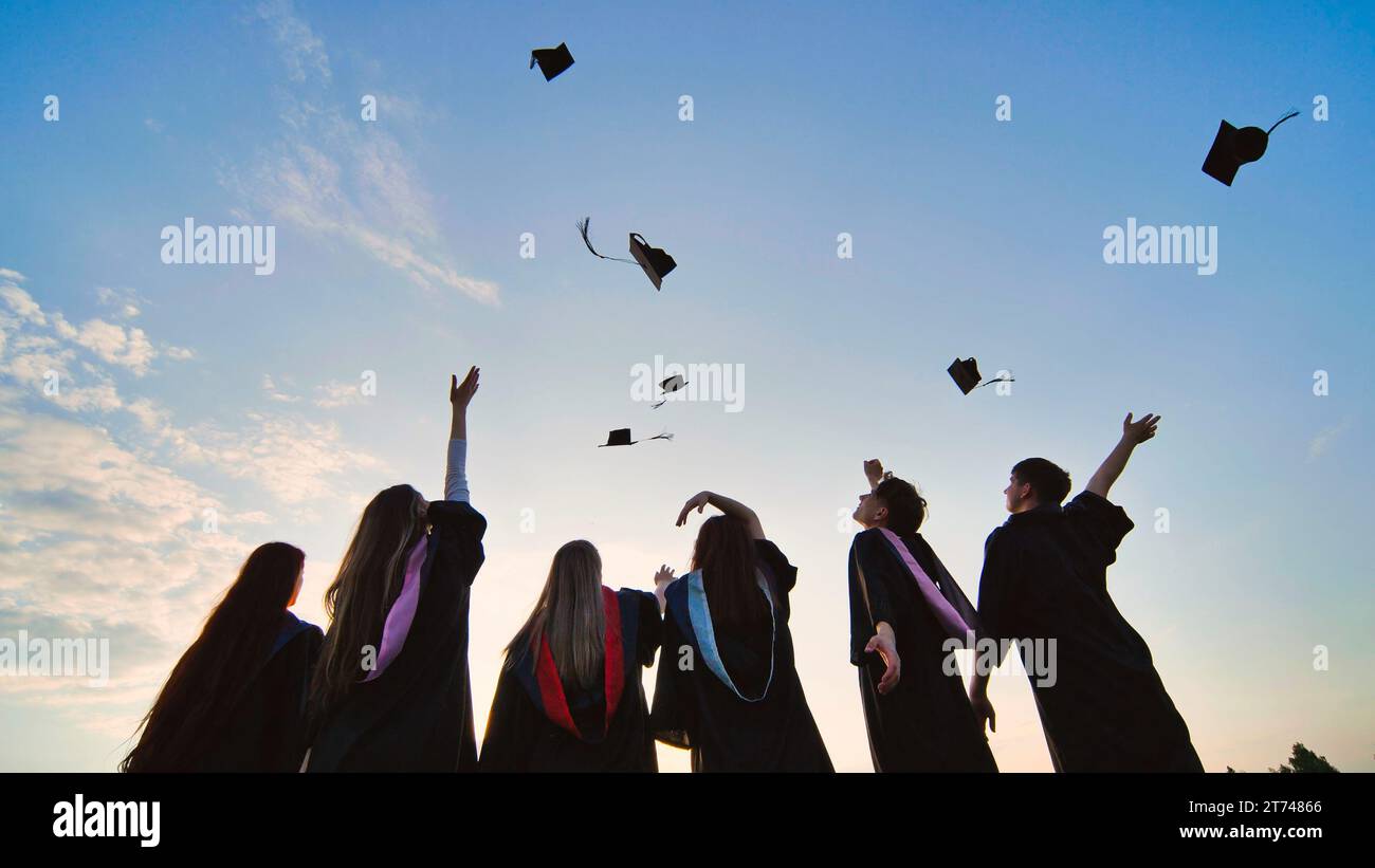 Graduates throwing caps black hi-res stock photography and images - Alamy