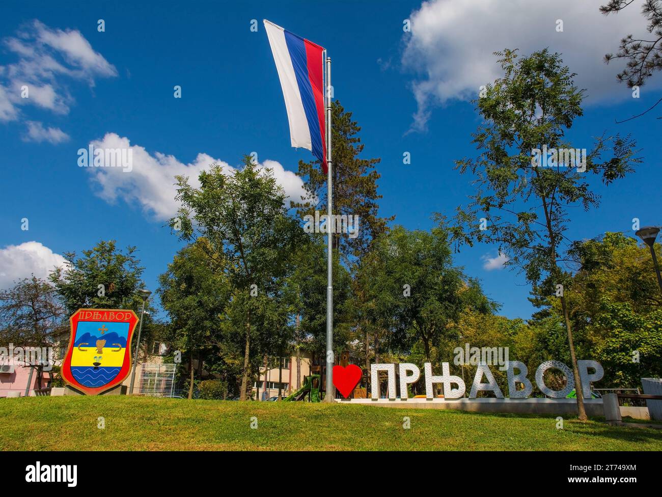 The town coat of arms and Republika Srpska flag welcome people to ...