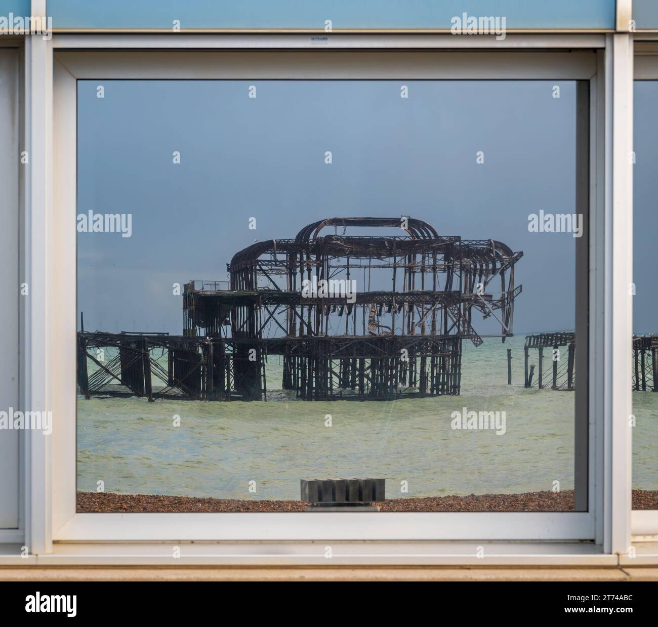 The ruins of West Pier reflecting in the windows of BA i360 building on ...