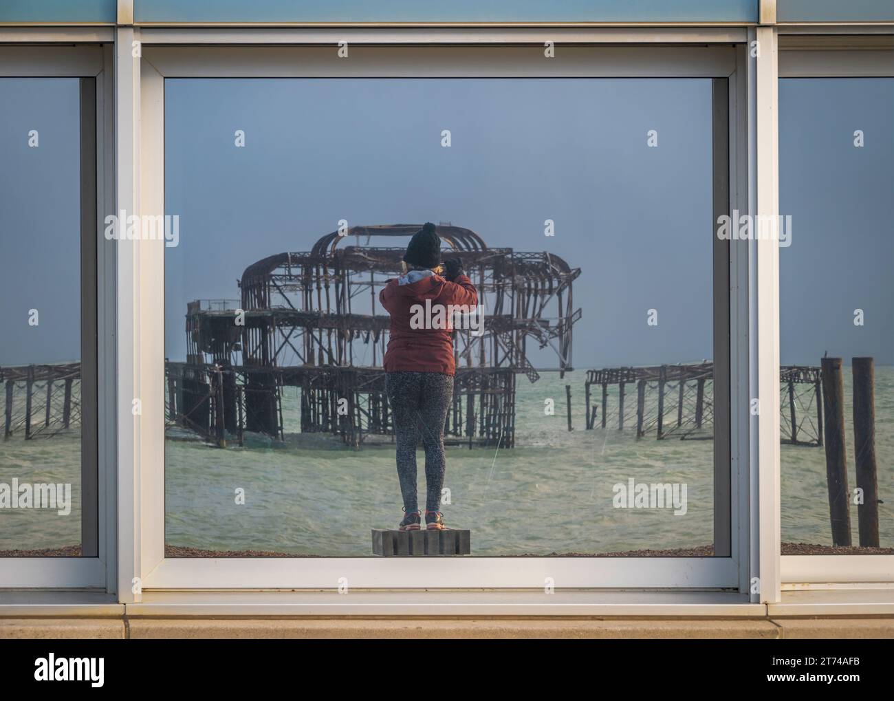 The ruins of West Pier reflecting in the windows of BA i360 building on ...