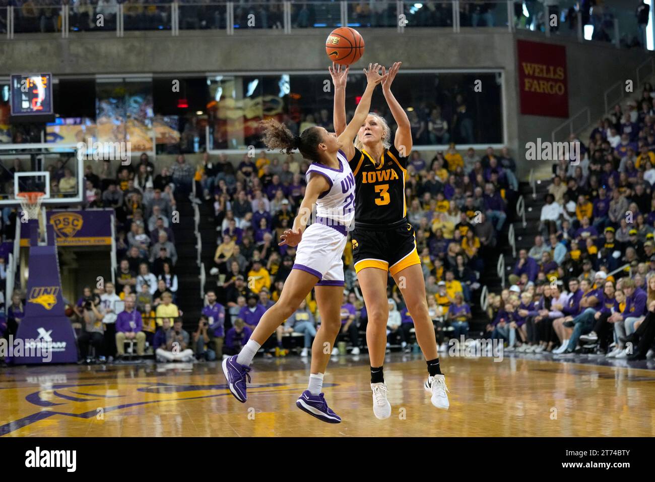 Iowa guard Sydney Affolter (3) shoots over Northern Iowa guard Taryn ...