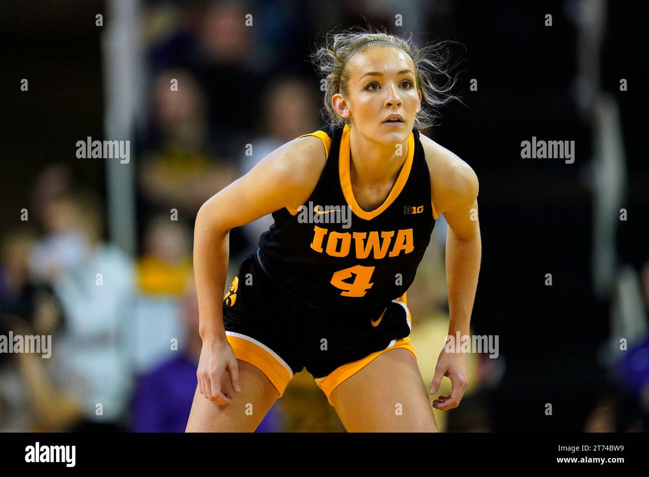 Iowa guard Kylie Feuerbach (4) plays defense during the second half of ...