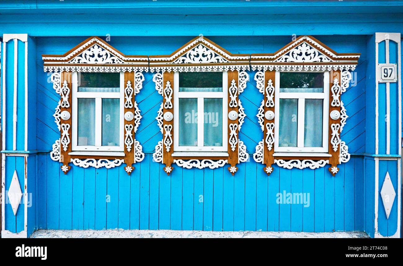 Windows with carved platbands in a russian village hut Stock Photo - Alamy
