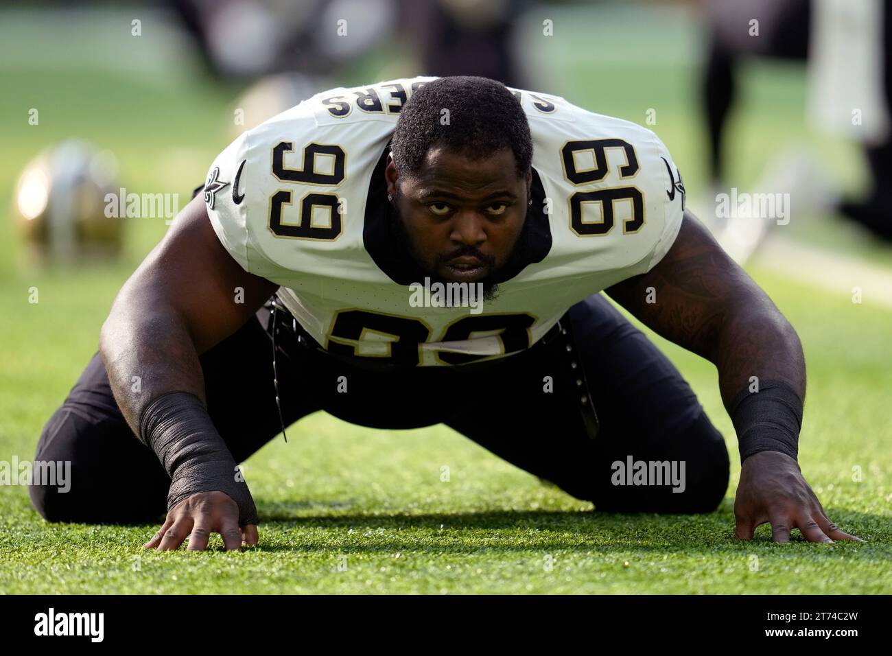 New Orleans Saints defensive tackle Khalen Saunders (99) stretches ...
