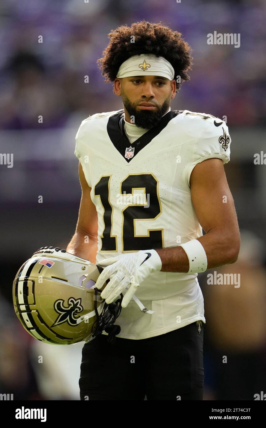 New Orleans Saints wide receiver Chris Olave (12) stands on the field ...