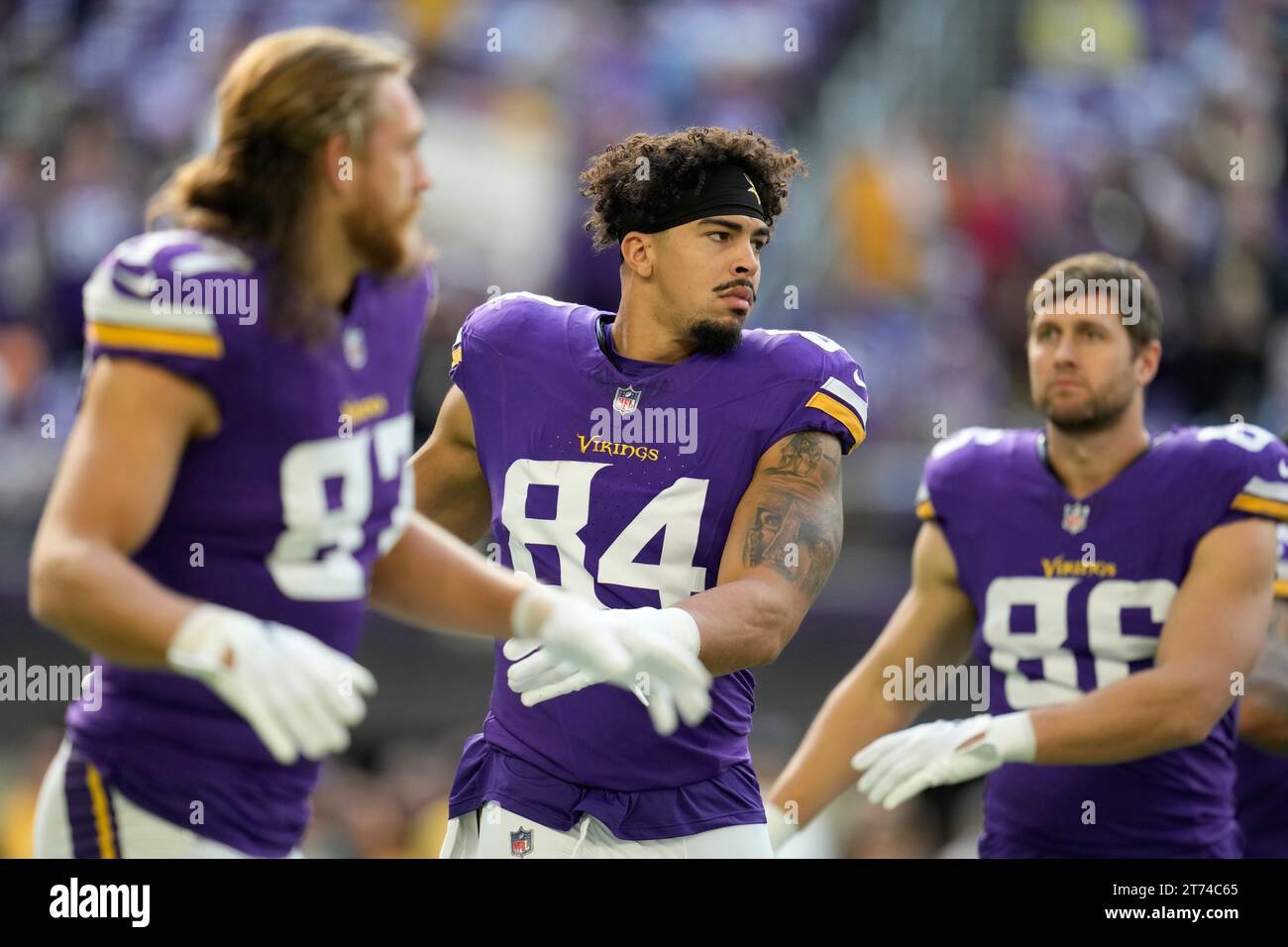Minnesota Vikings tight end Josh Oliver (84) stretches before an NFL ...