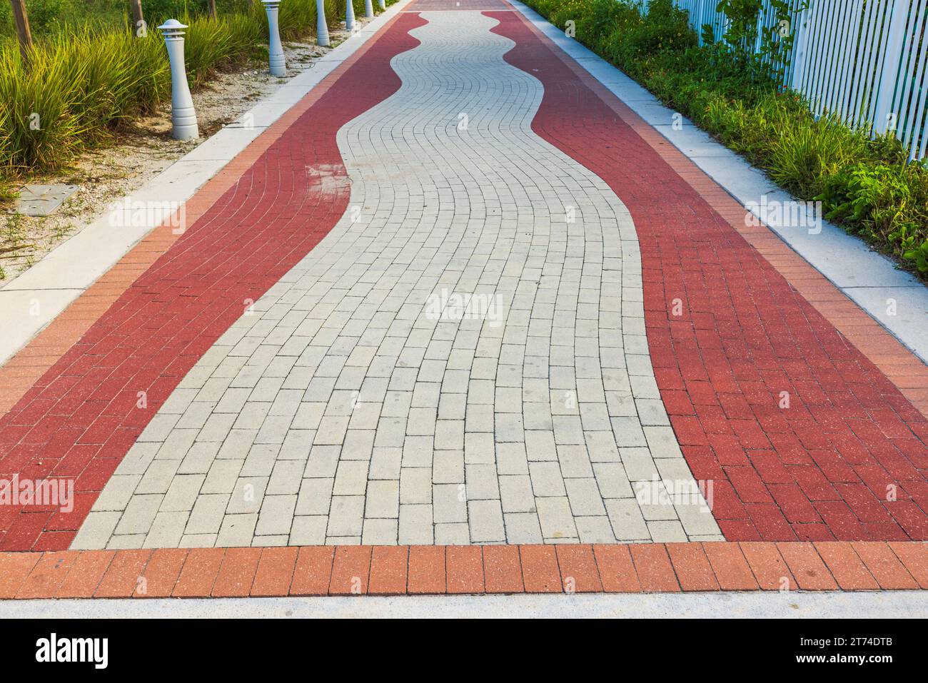 View of texture paving stones of red path called Walking Street, in ...