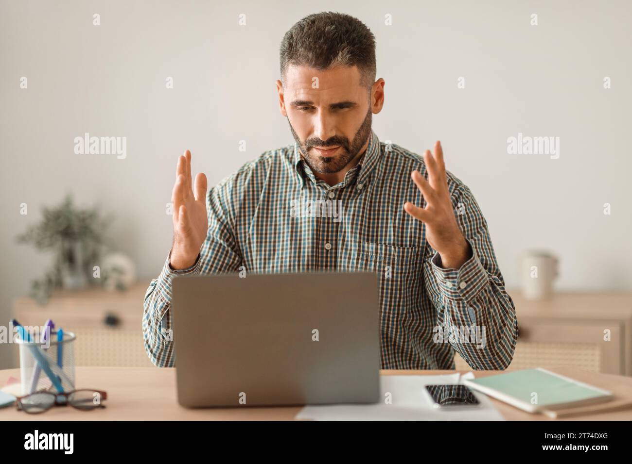 Angry middle aged businessman sitting hi-res stock photography and ...