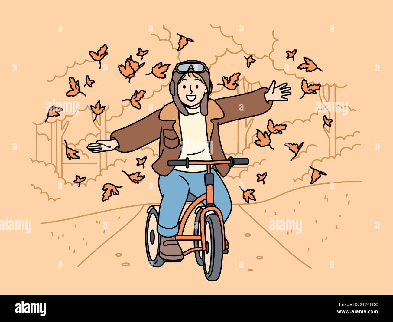 Happy child rides bicycle through autumn park and spreads arms to sides ...