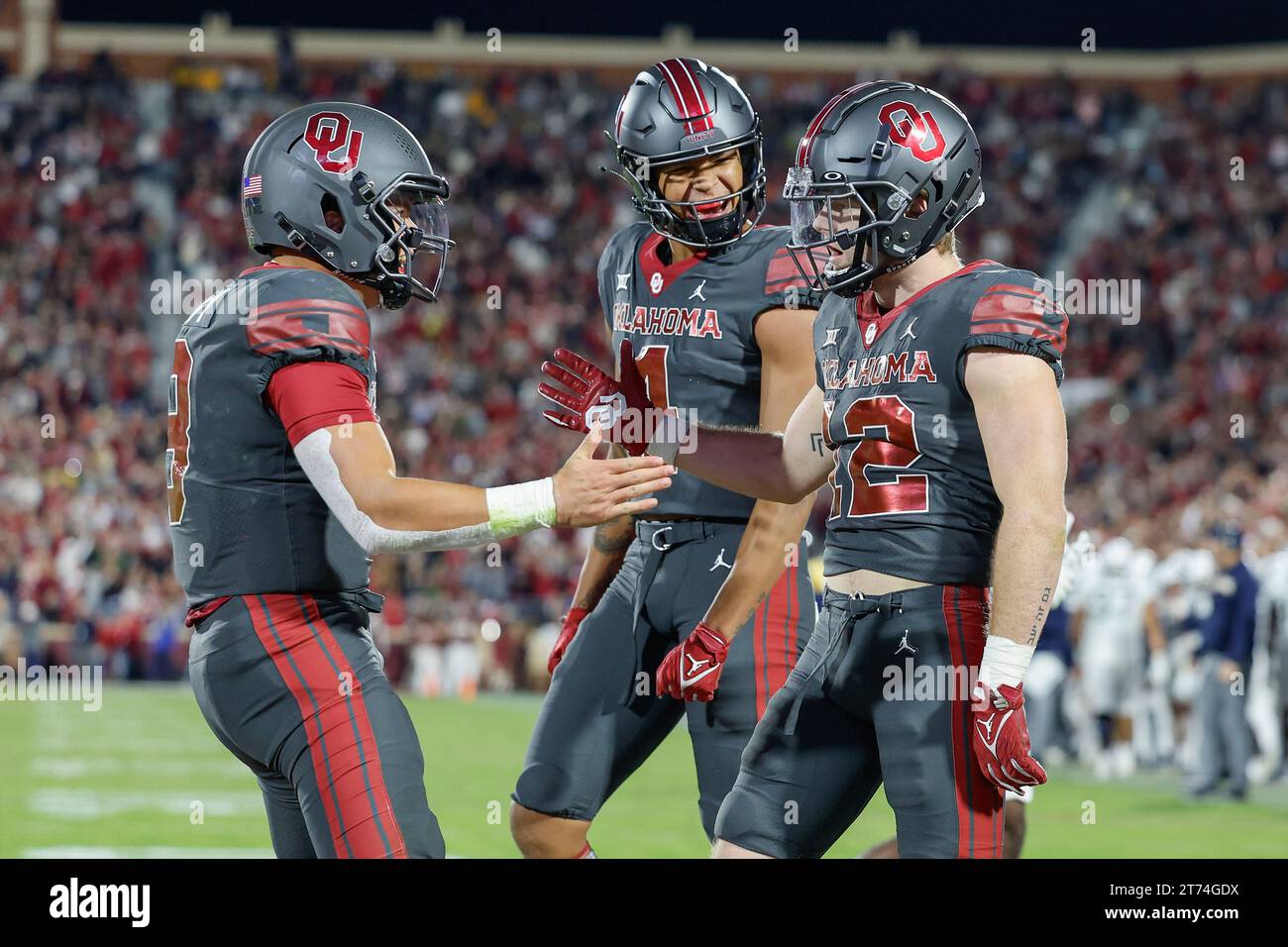 Oklahoma wide receiver Drake Stoops (12) celebrates a touchdown during ...