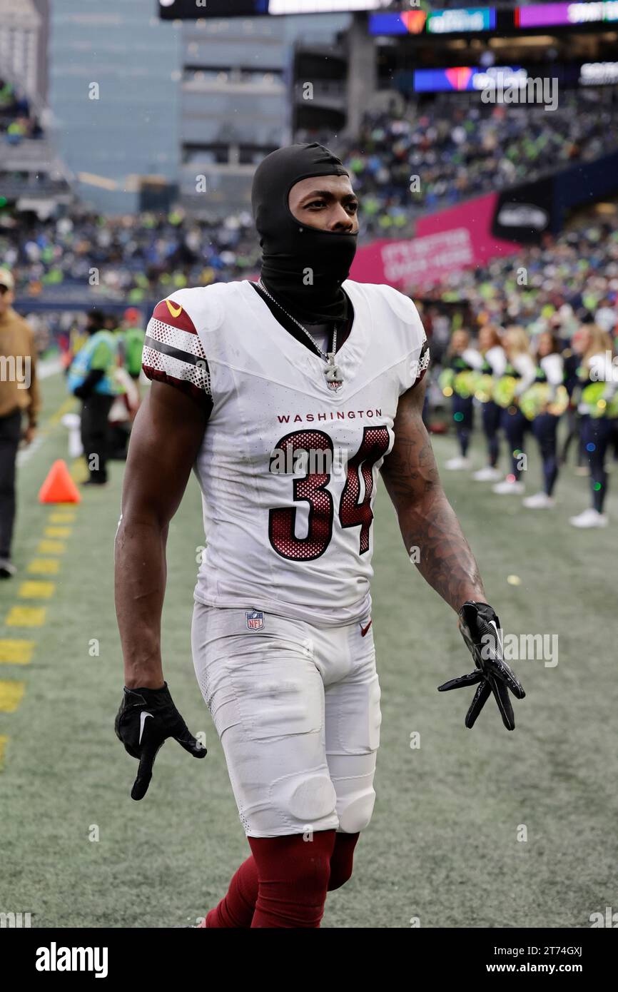 Washington Commanders cornerback Christian Holmes walks off the field ...