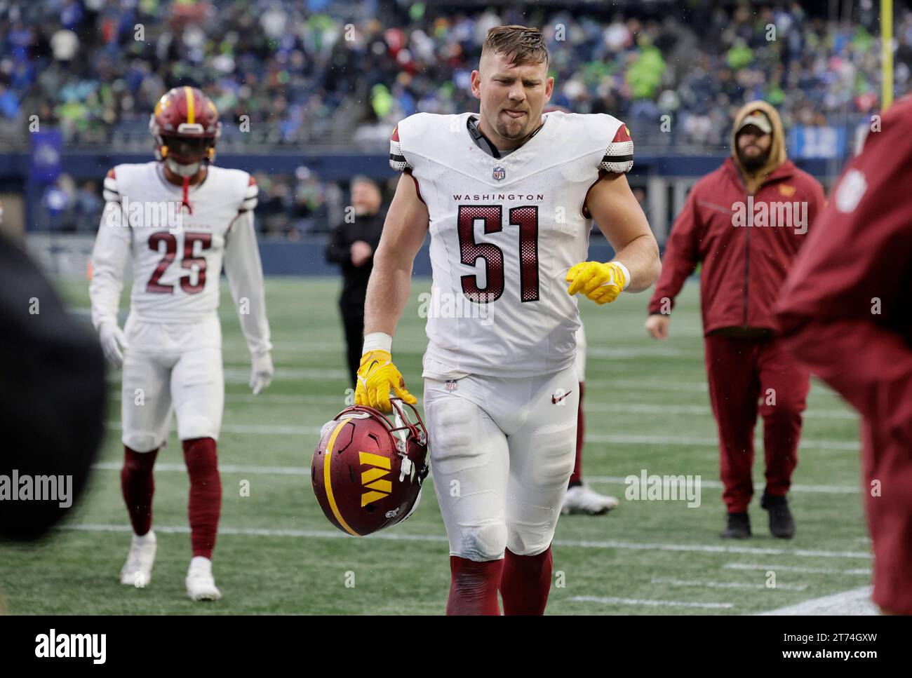 Washington Commanders linebacker David Mayo walks off the field with ...