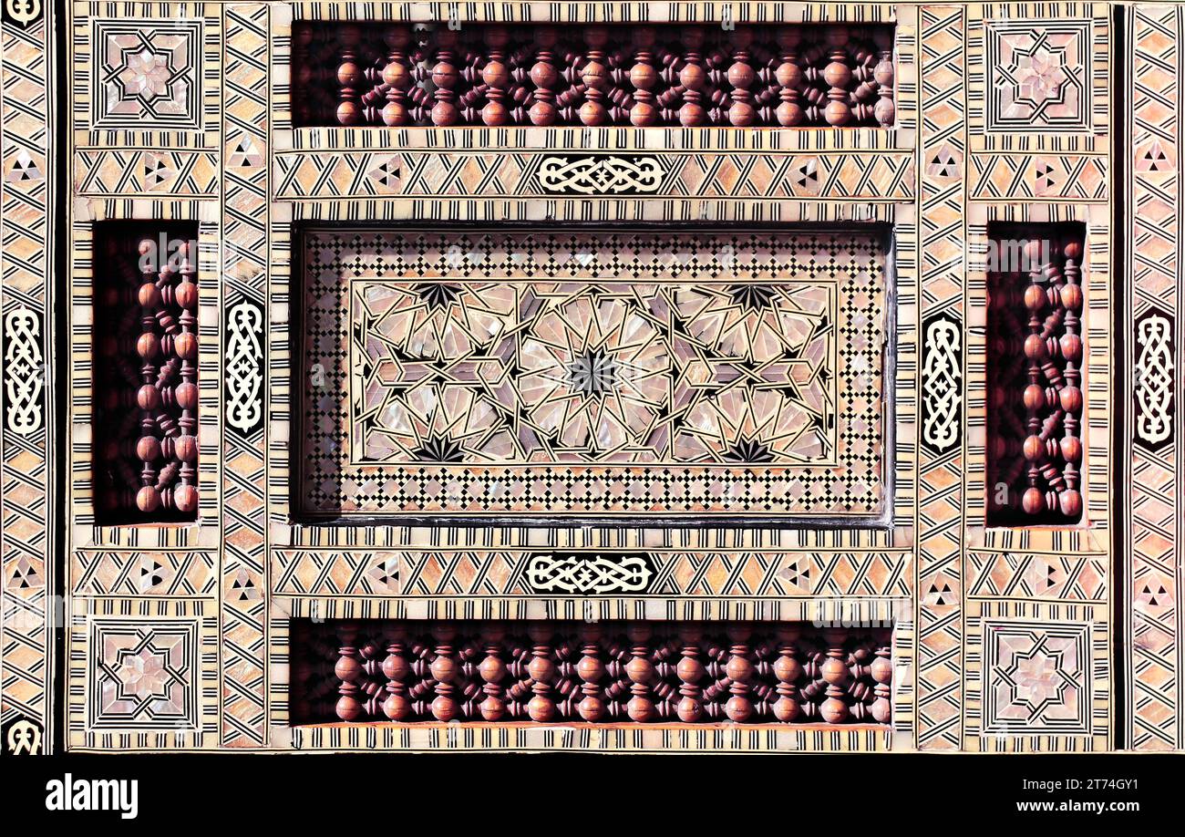 Detail of ancient mosaic window shutter with mother-of-pearl and wood ...