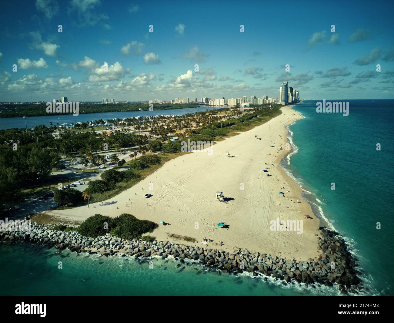 A crystal-clear blue ocean view in Miami, USA, with white sandy beach ...