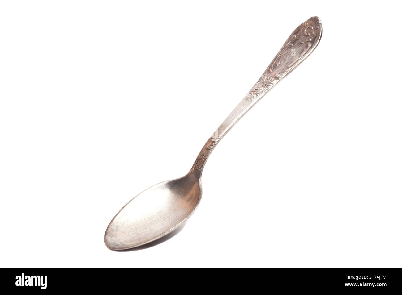 Old teaspoon isolated on white background Stock Photo - Alamy