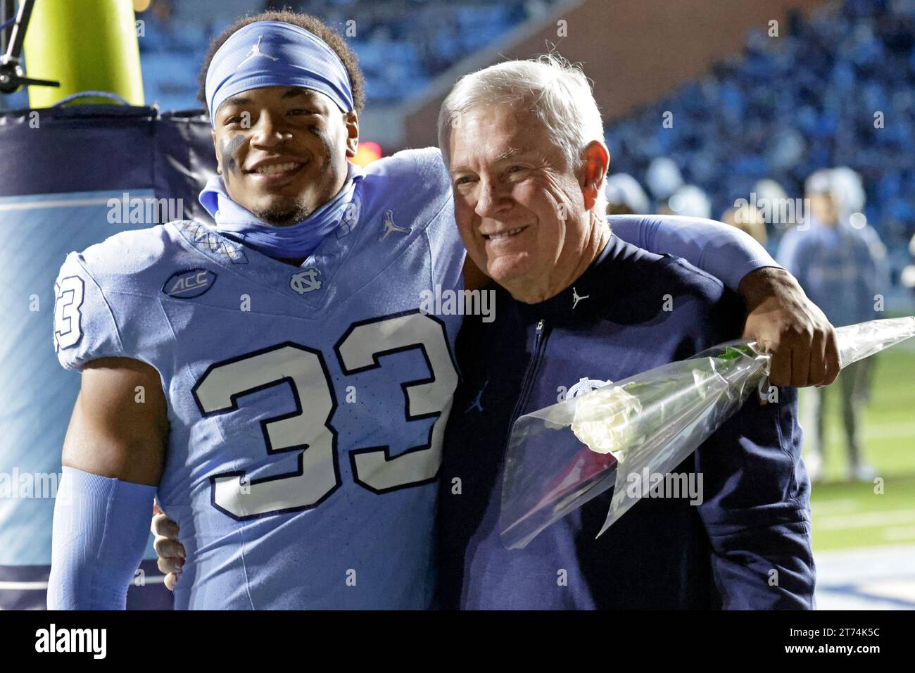 North Carolina linebacker Cedric Gray (33) poses for a photo with head ...