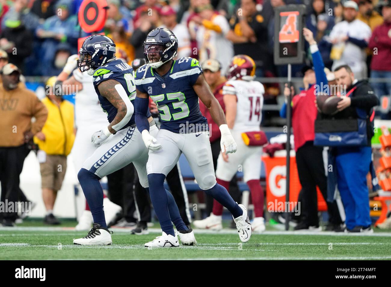 Seattle Seahawks linebacker Boye Mafe (53) runs in between plays ...