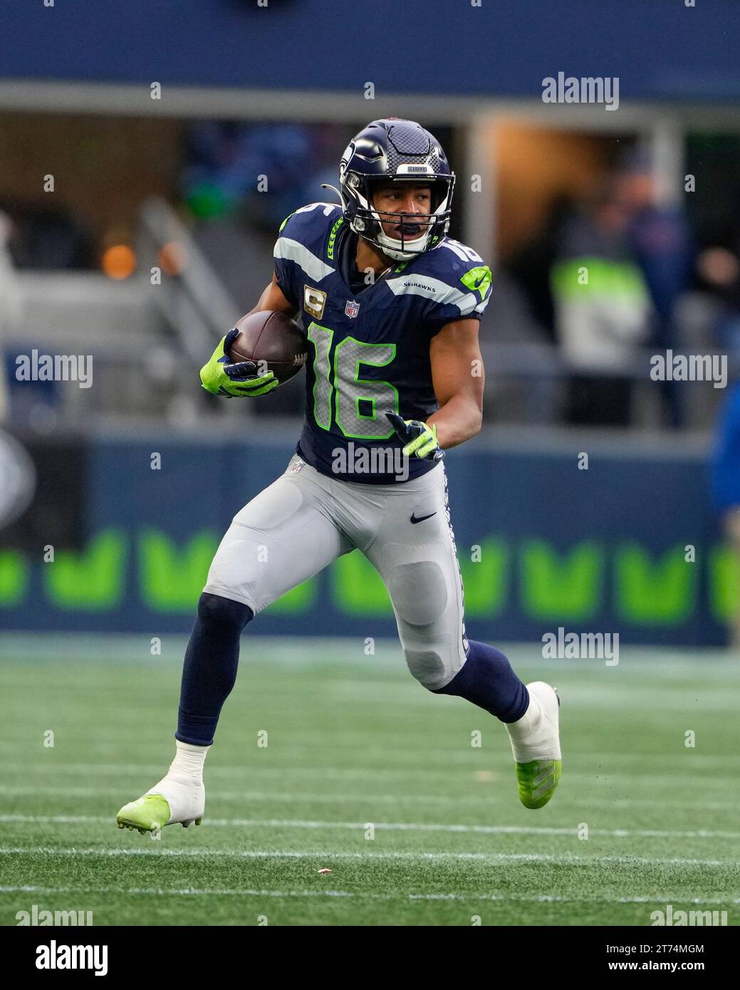 Seattle Seahawks wide receiver Tyler Lockett runs with the ball against ...