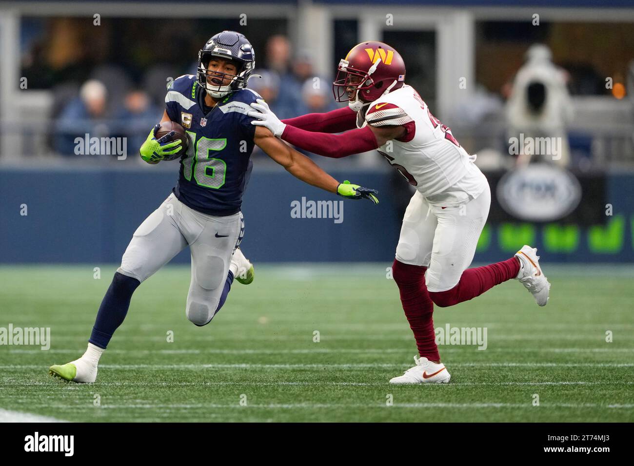 Seattle Seahawks wide receiver Tyler Lockett runs the ball against ...
