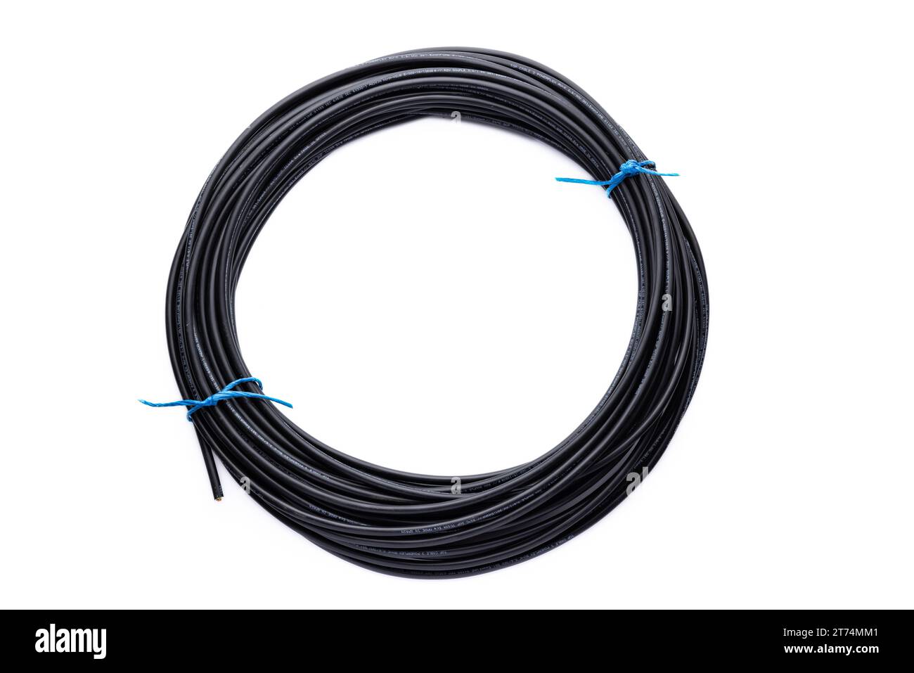 Black wire cooper cable isolated on a white background Stock Photo - Alamy
