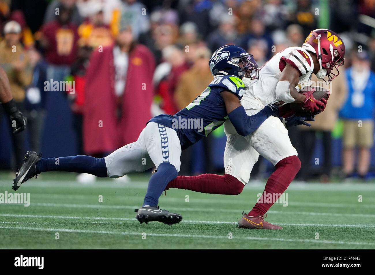 Seattle Seahawks cornerback Devon Witherspoon tackles Washington ...