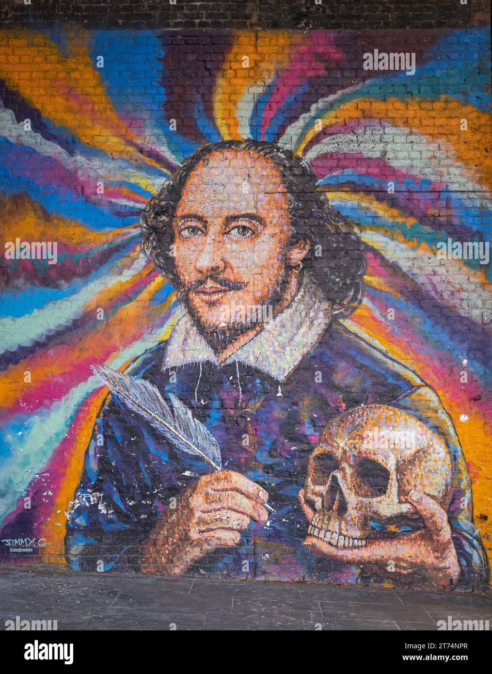 A large street art painting of William Shakespeare on a wall near ...