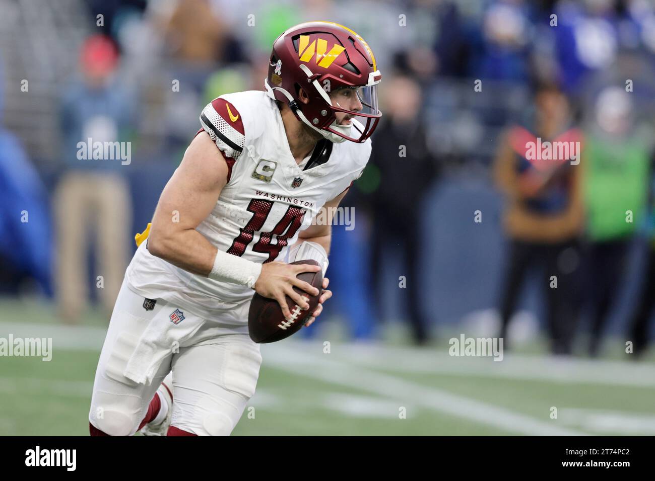 Washington Commanders quarterback Sam Howell looks for a receiver ...