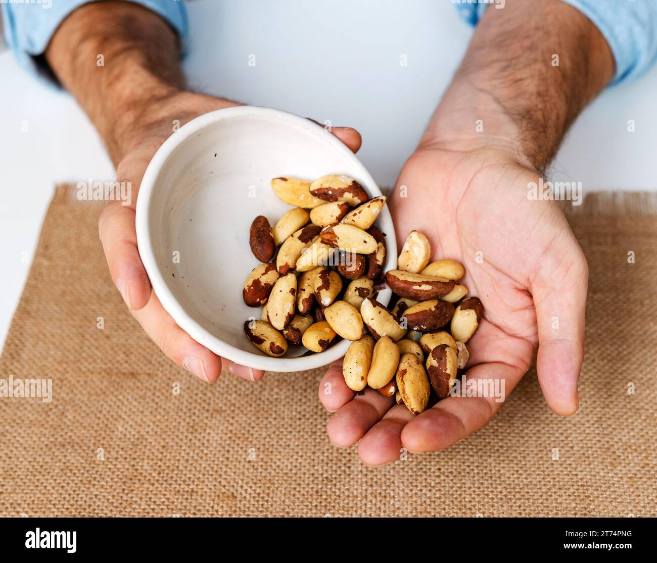 Handful nuts hi-res stock photography and images - Alamy