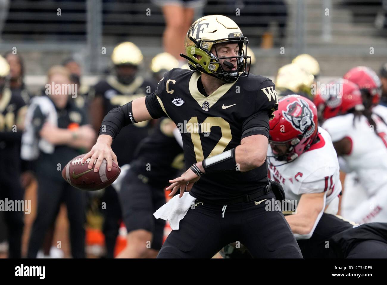 Wake Forest quarterback Mitch Griffis (12) looks to pass against North ...