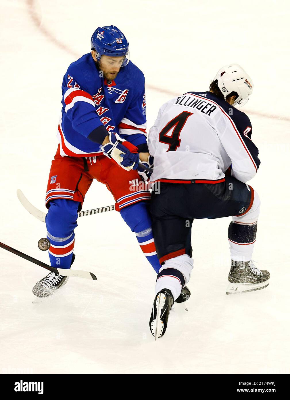 New York Rangers center Barclay Goodrow (21) battles for the puck ...