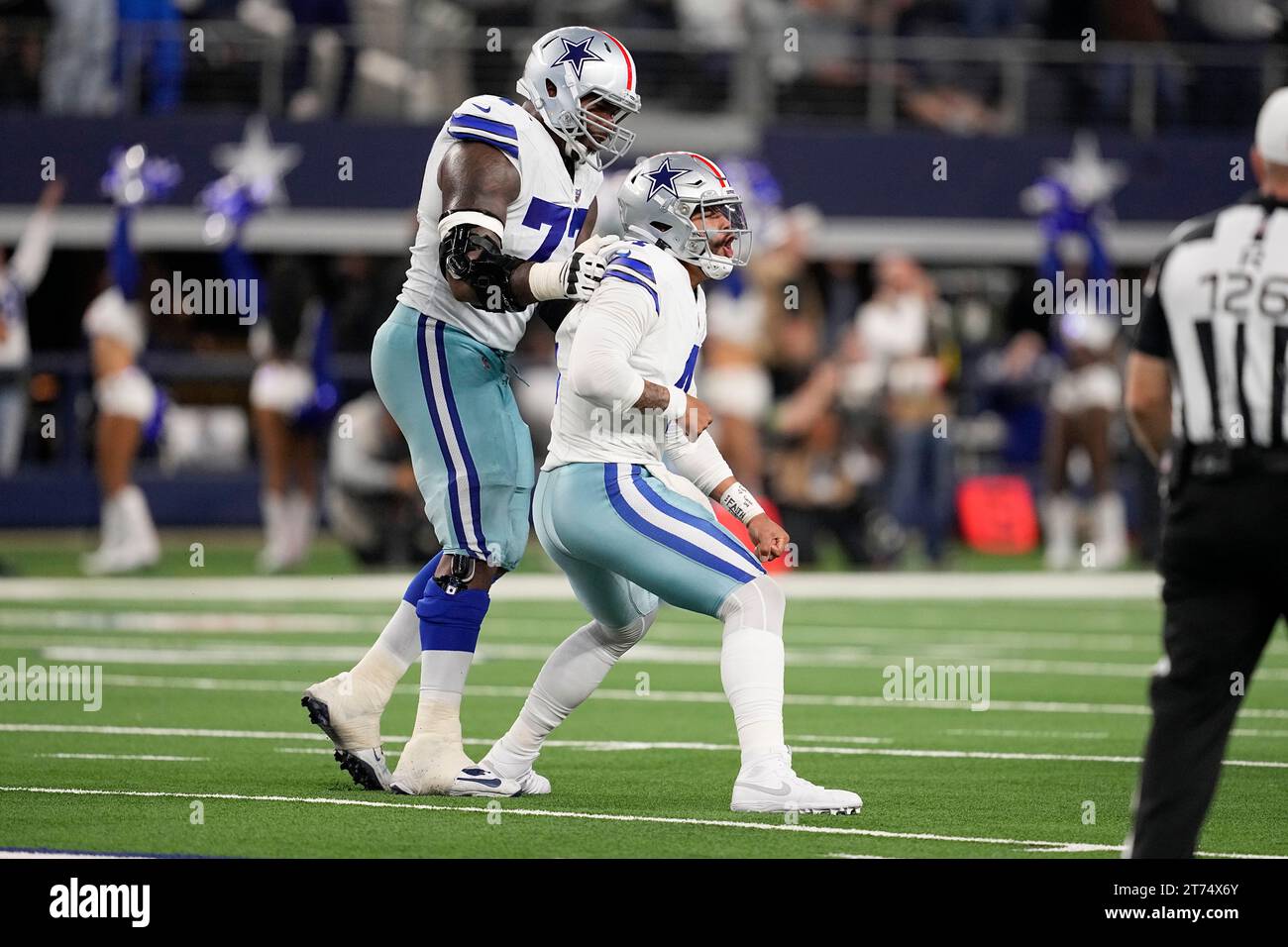 Dallas Cowboys offensive tackle Tyron Smith, left, and quarterback Dak ...
