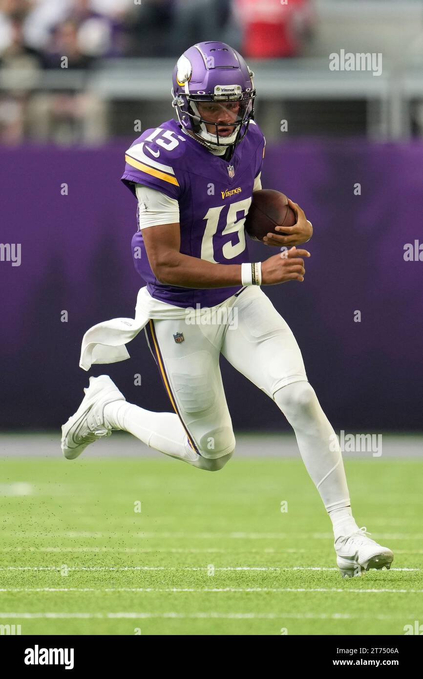 Minnesota Vikings quarterback Joshua Dobbs (15) runs with the football ...